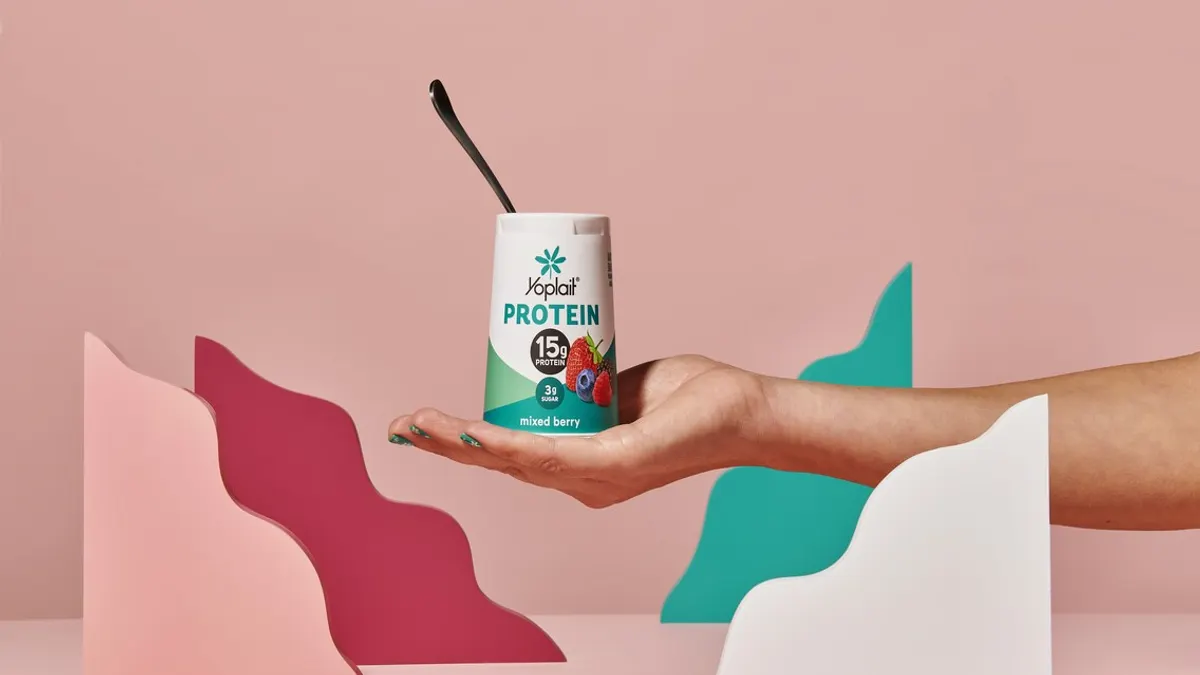 Yoplait muscles into protein space with new yogurt | Food Dive