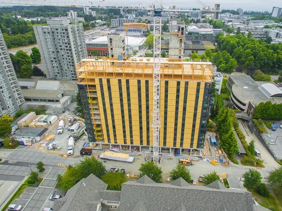 World's tallest timber tower tops out in Canada | Construction Dive